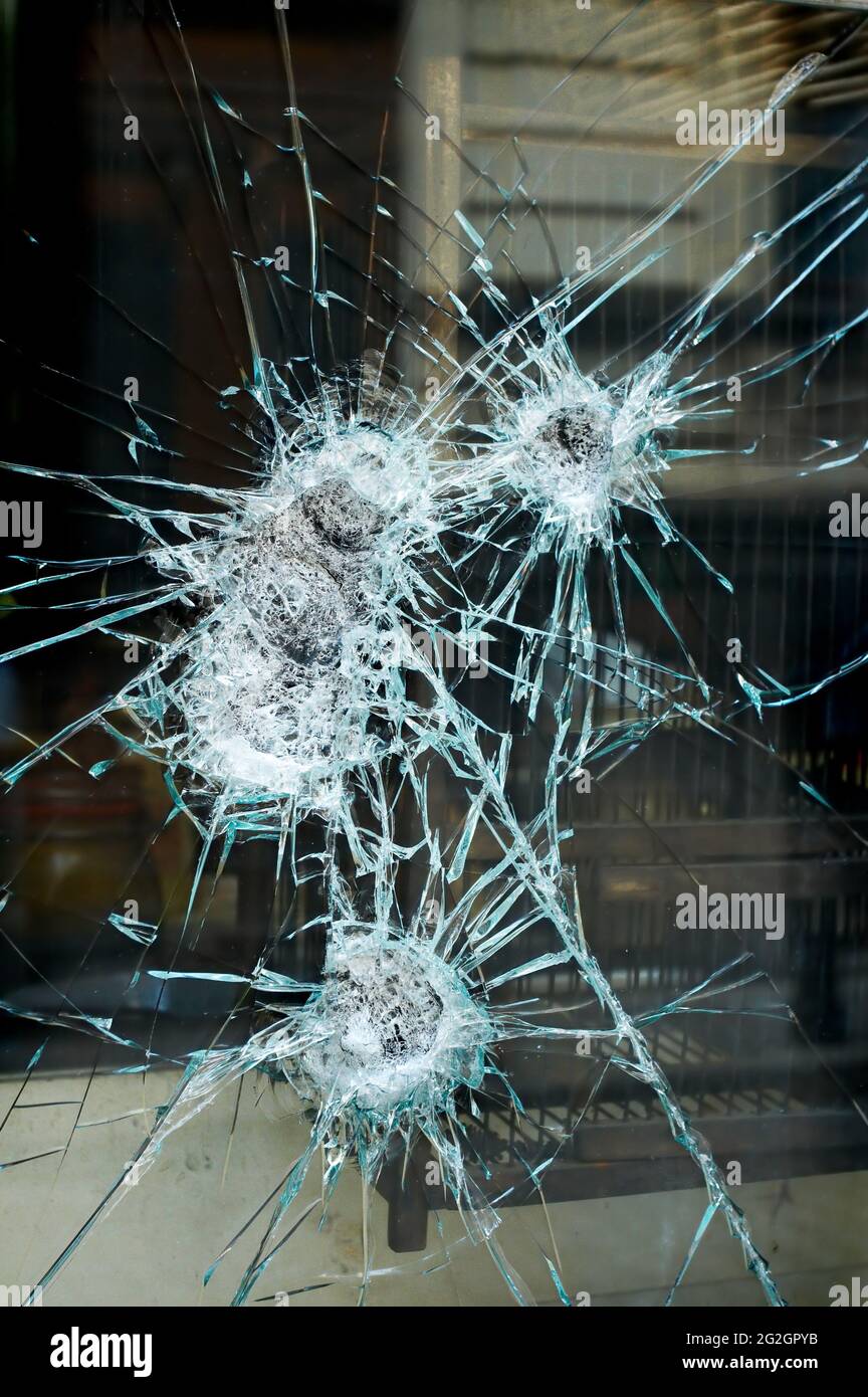 Smashed shop window after an burglary attempt Stock Photo - Alamy