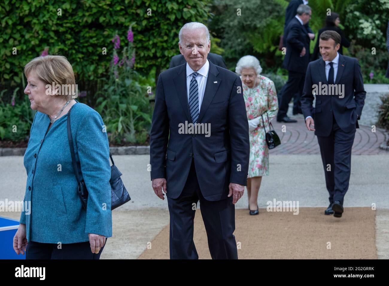 US President Joe Biden makes his way for a group photo before a ...