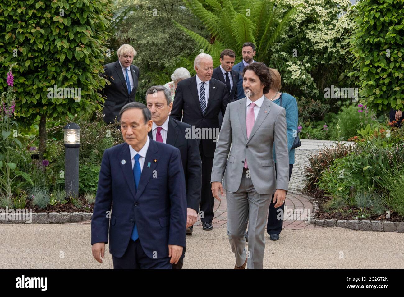 G7 leaders make their way for a group photo before a reception at the ...