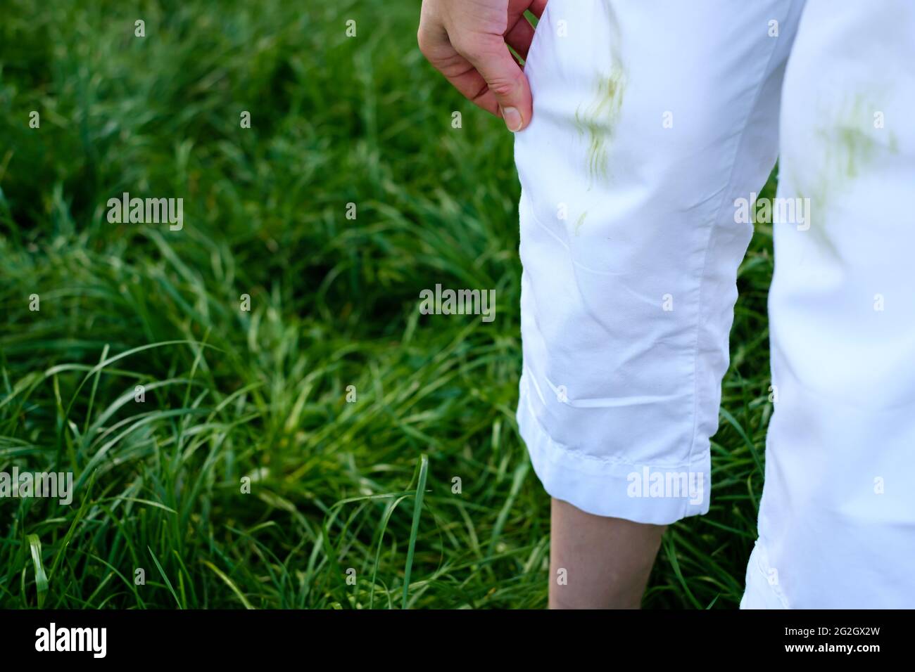 Washing grass stain hi-res stock photography and images - Alamy