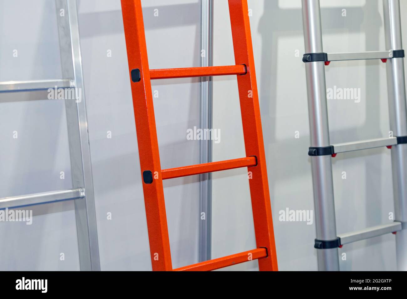 Aluminium and Steel Metal Ladders in Building Stock Photo - Alamy