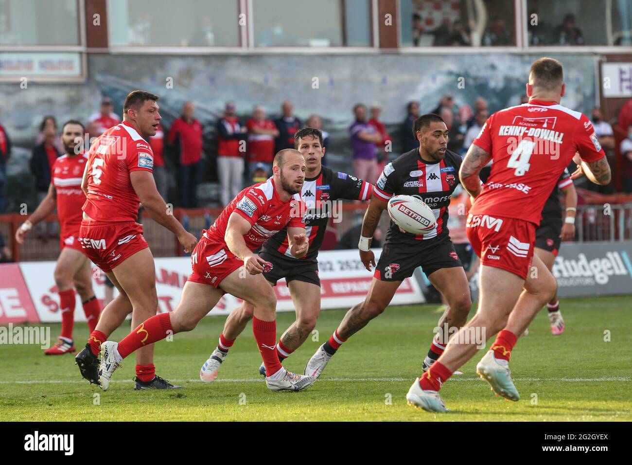 Adam Quinlan (1) of Hull KR passes to Shaun Kenny-Dowall (4) of Hull KR ...