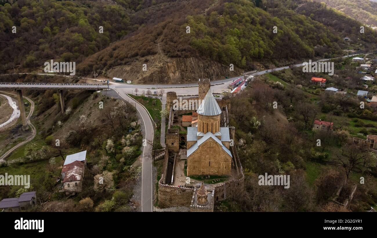 aerial view of Medieval Churches in Ananuri Fortress Against the Emeral ...
