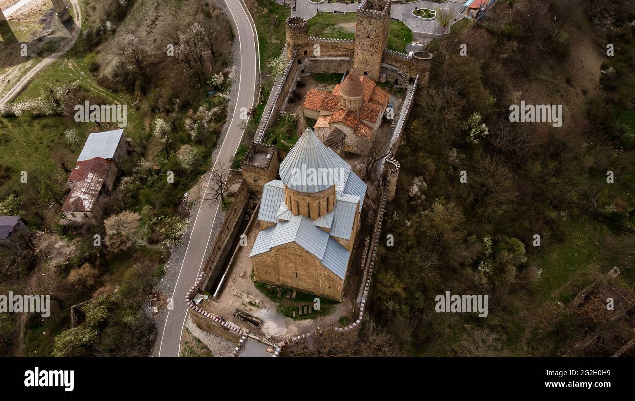 aerial view of Medieval Churches in Ananuri Fortress Against the Emeral ...