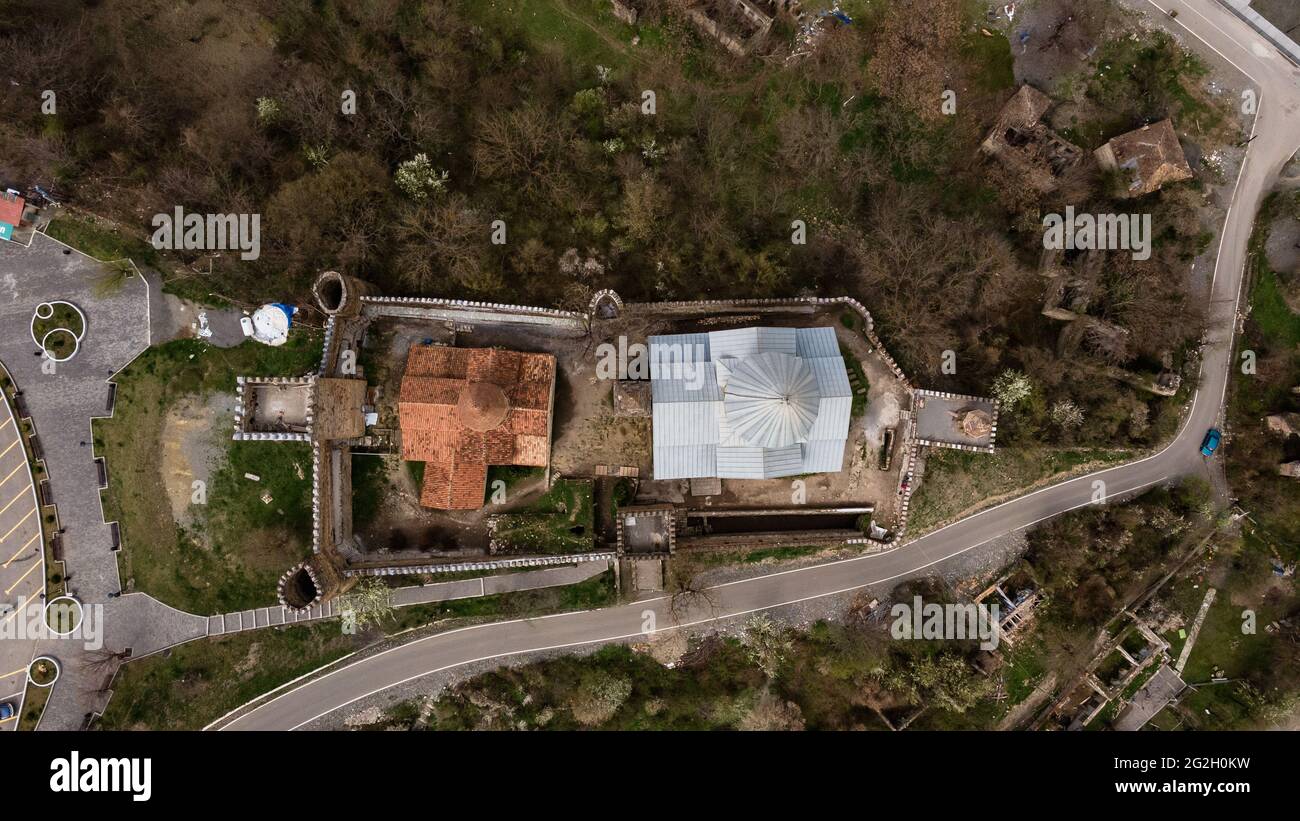 aerial view of Medieval Churches in Ananuri Fortress Against the Emeral ...