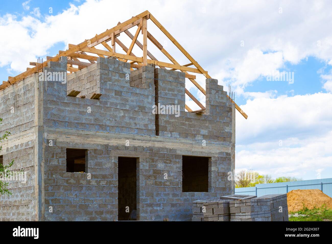 Construction of a private country house from a cinder block. Roof ...