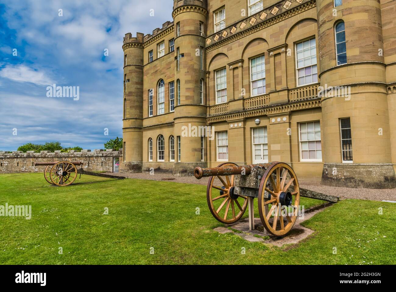 Scotland. Culzean Castle main building with Napoleonic era artillery ...