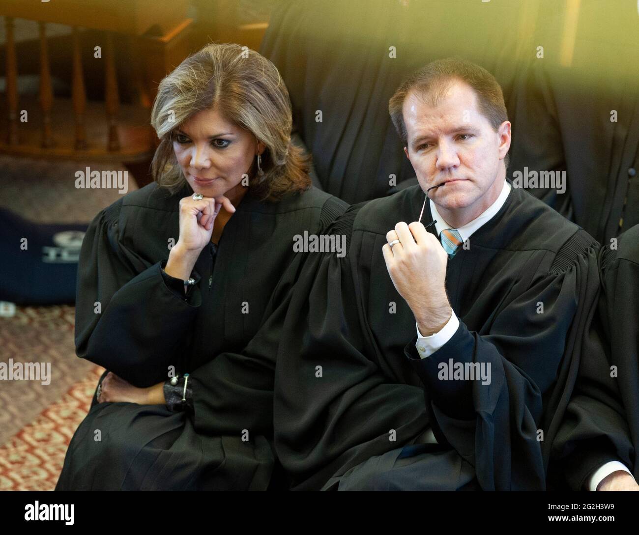 Texas Supreme Court Justice Eva Guzman, left, with Justice Don Willett ...