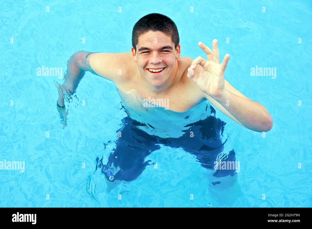 Handsome young man swimming under hi-res stock photography and images ...
