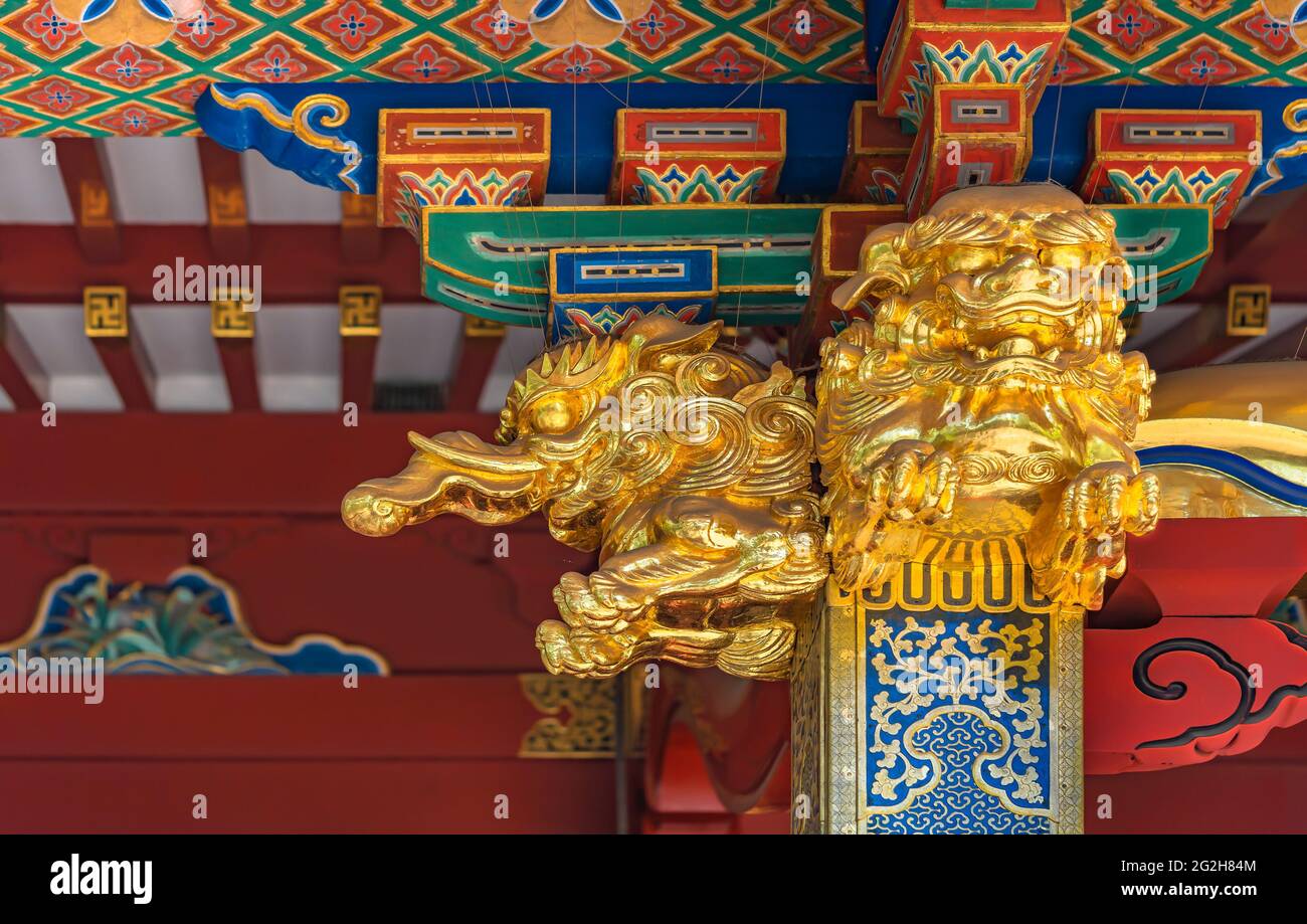 tokyo, japan - june 11 2021: Close up on Japanese golden sculptures ...