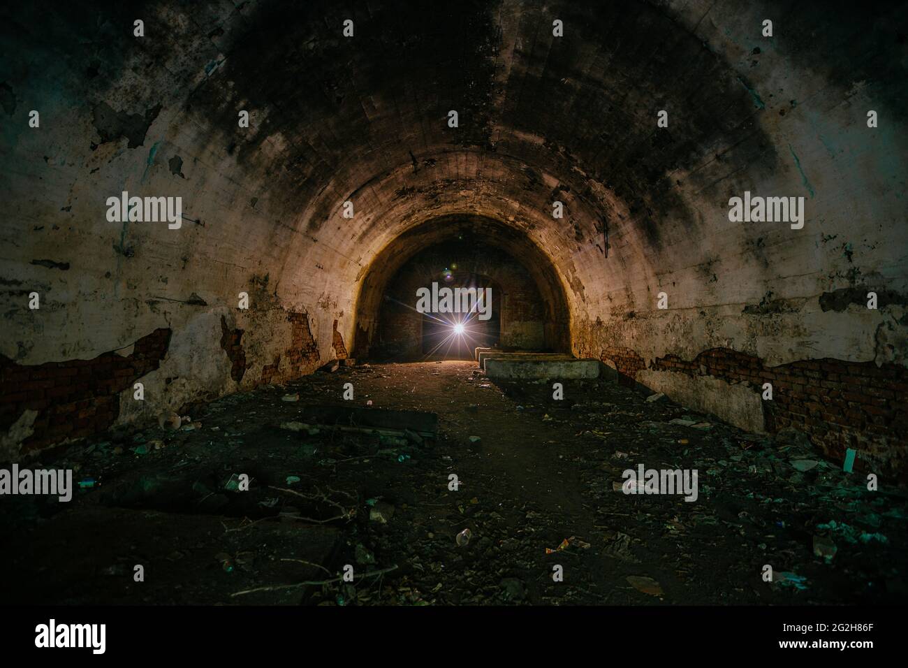 Large old historical underground red brick tunnel Stock Photo - Alamy