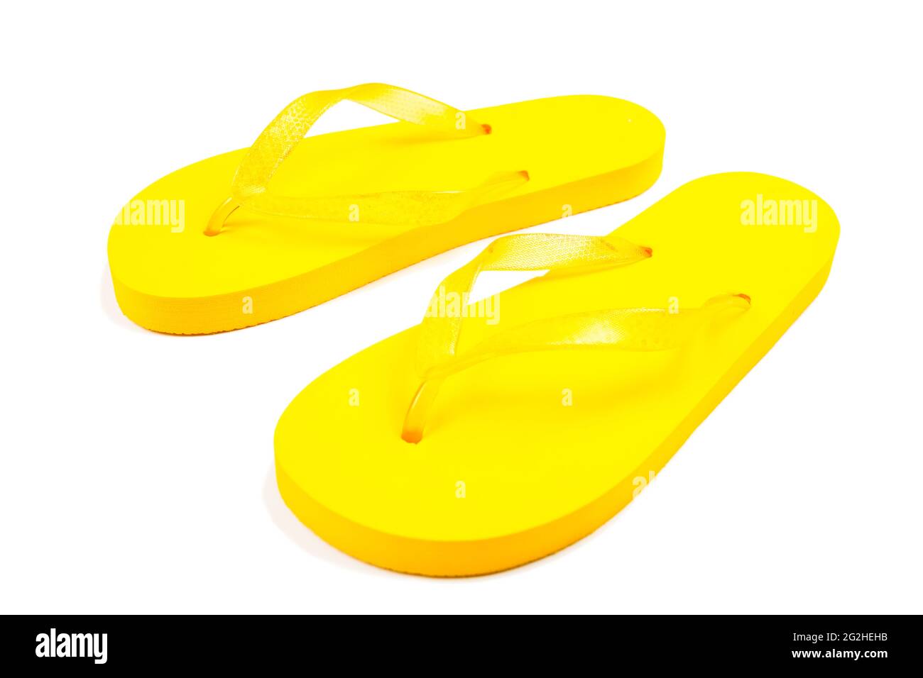 Yellow flip flops on white hi-res stock photography and images - Alamy