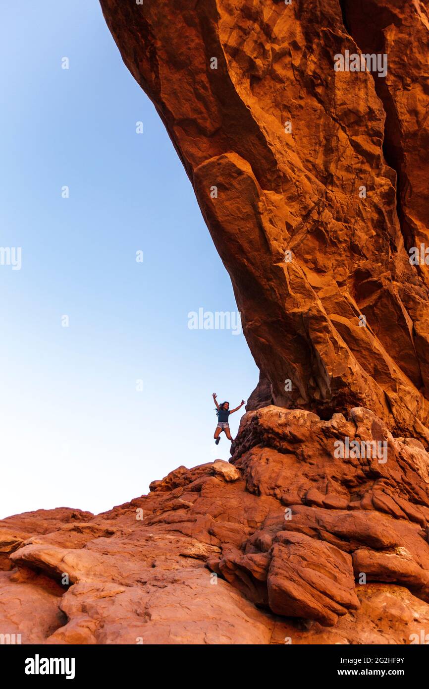 Happy jumping inside the North Window Arch on the north side of the ...