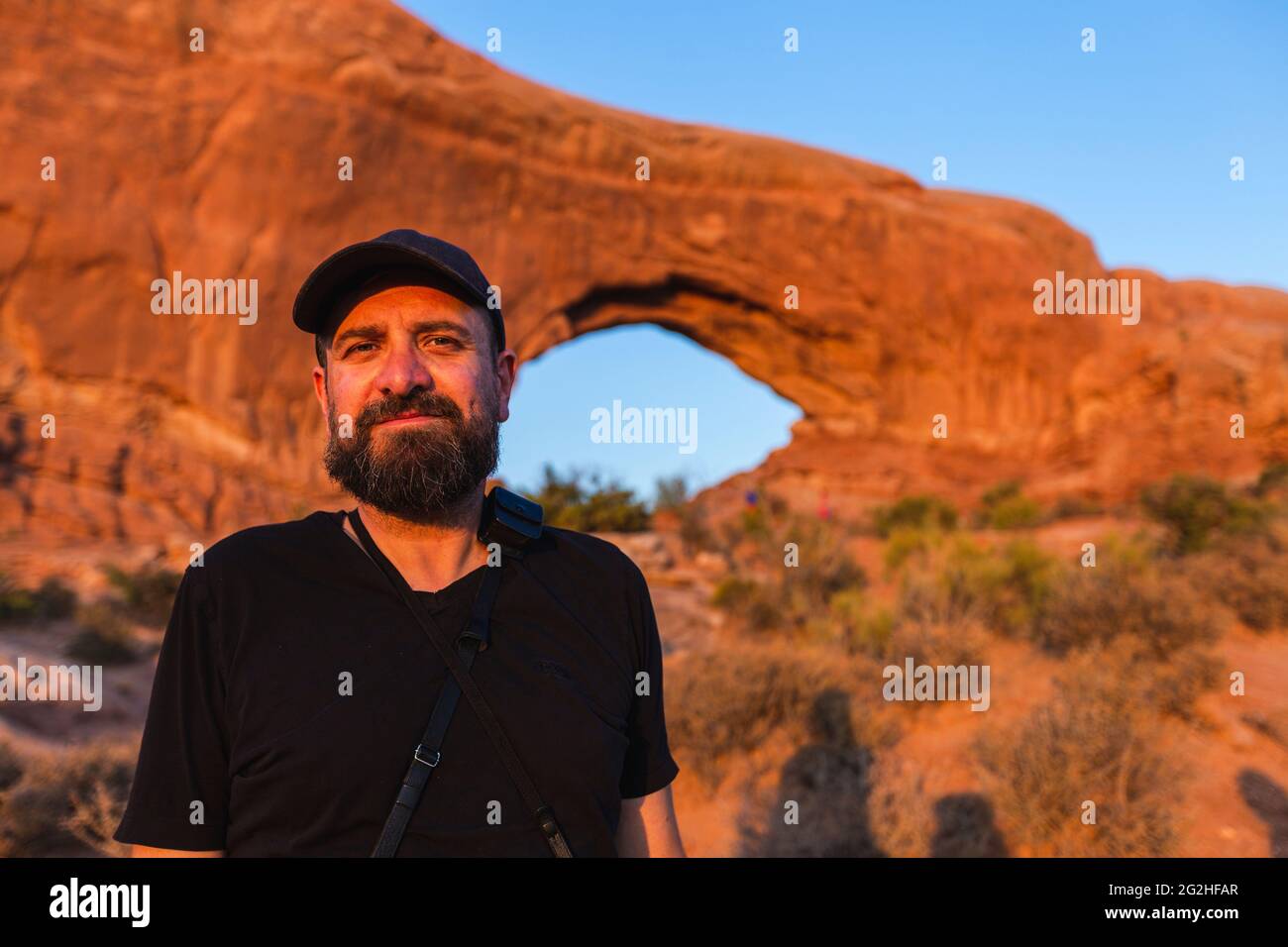 A Man in front of the North Window Arch. Arch on the north side of the ...