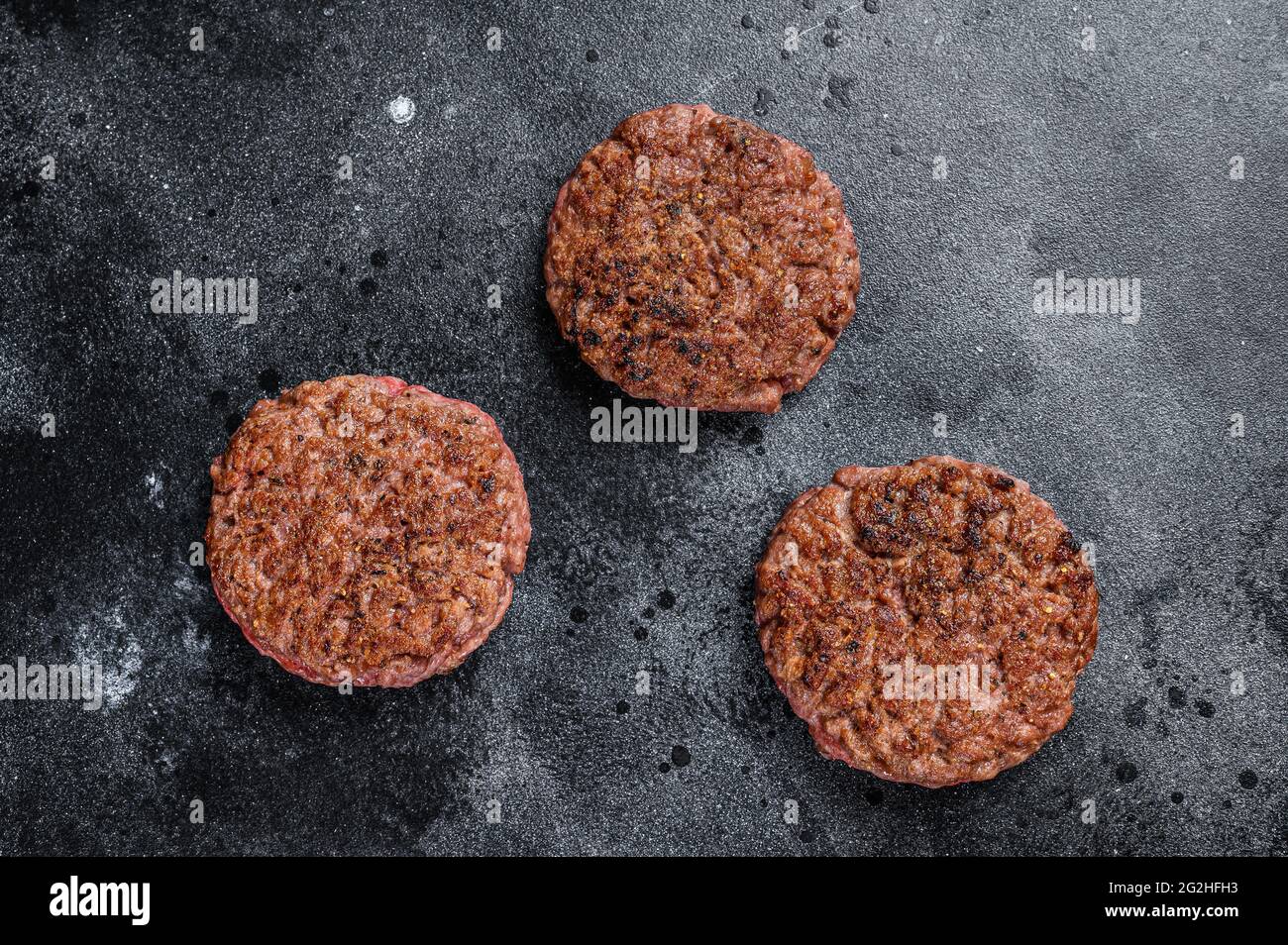 Grilled ground beef steak patties for burgers, Mince meat. Black ...