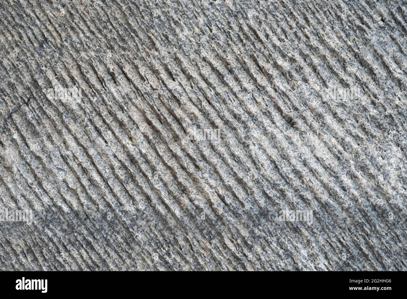 Carved stone surface with deep grooves and furrows Stock Photo - Alamy