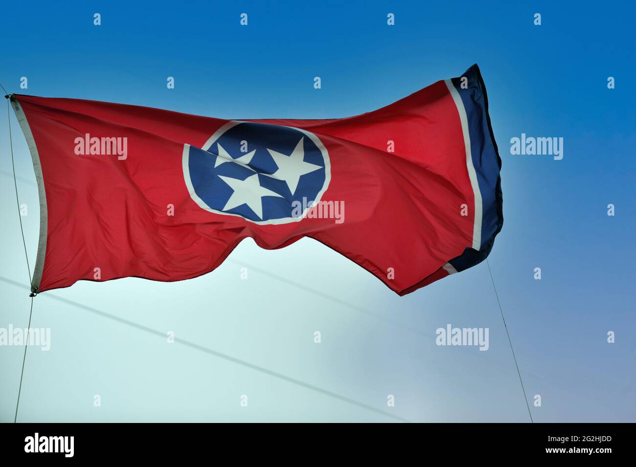 Nashville, Tennessee, USA. State flag of Tennessee unfurled by a stiff ...