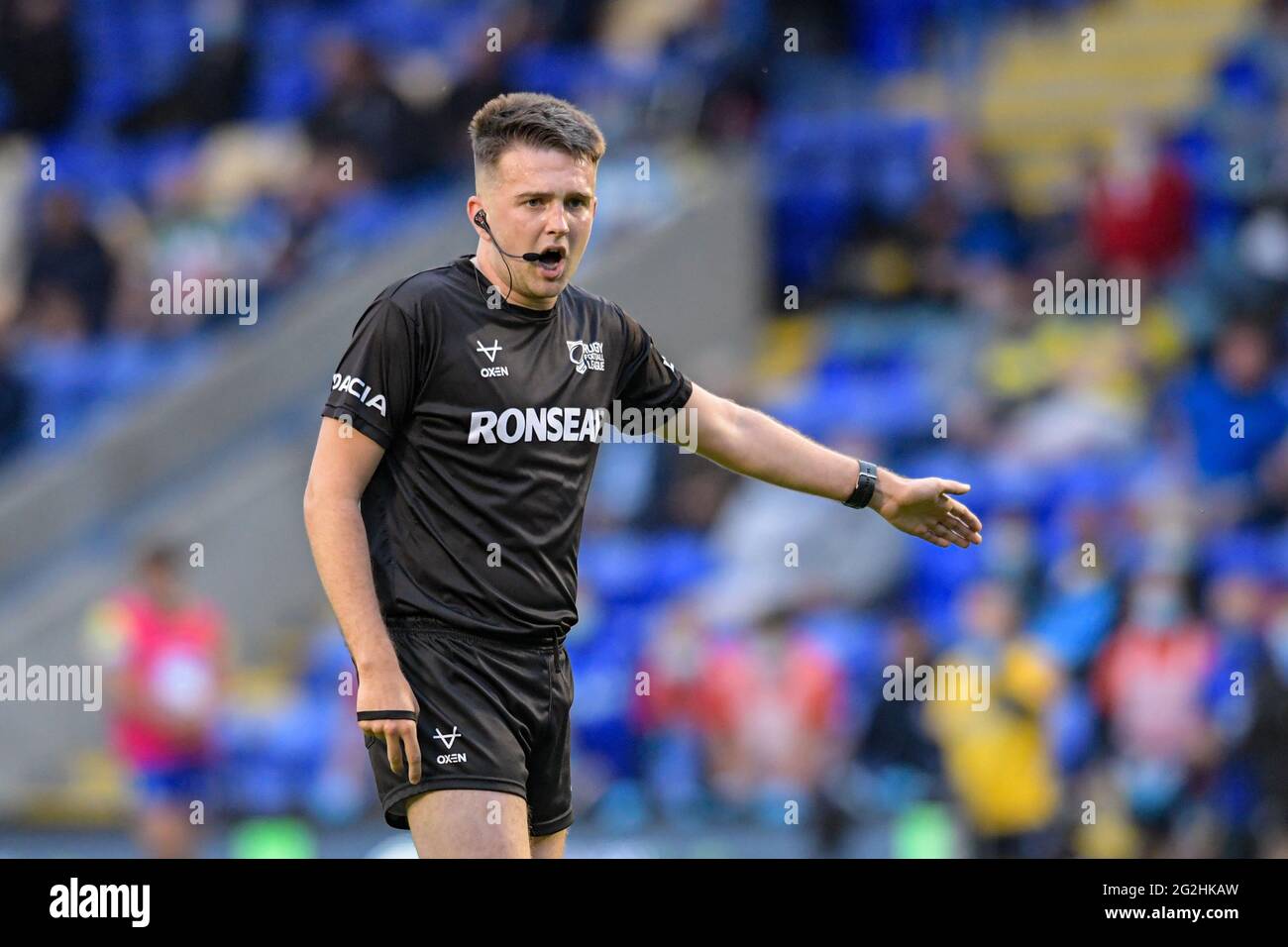 Referee Marcus Griffiths gives instructions during the game Stock Photo ...