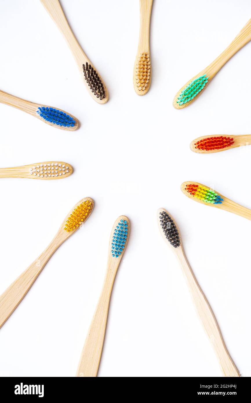 Set of eco-friendly, colorful bamboo toothbrushes. Environmental trends ...
