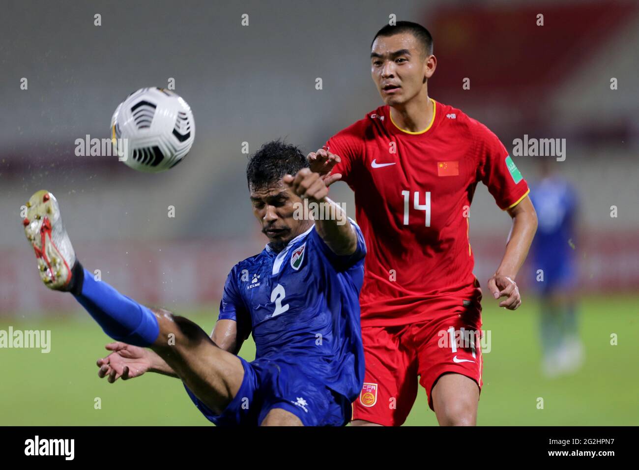 Sharjah. 12th June, 2021. Liu Binbin (R) of China vies with Samooh Ali ...