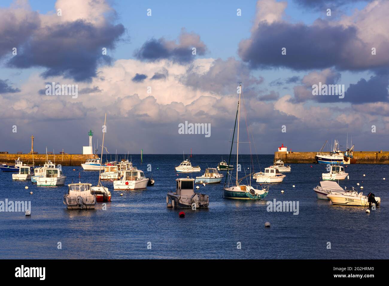 Boats in the port of Barfleur, evening light, France, Normandy ...