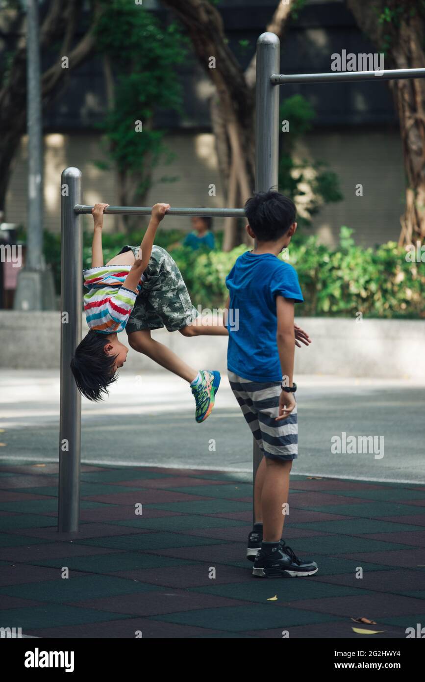 Taipei, Taiwan - July 2, 2018: A young child having fun playing on ...
