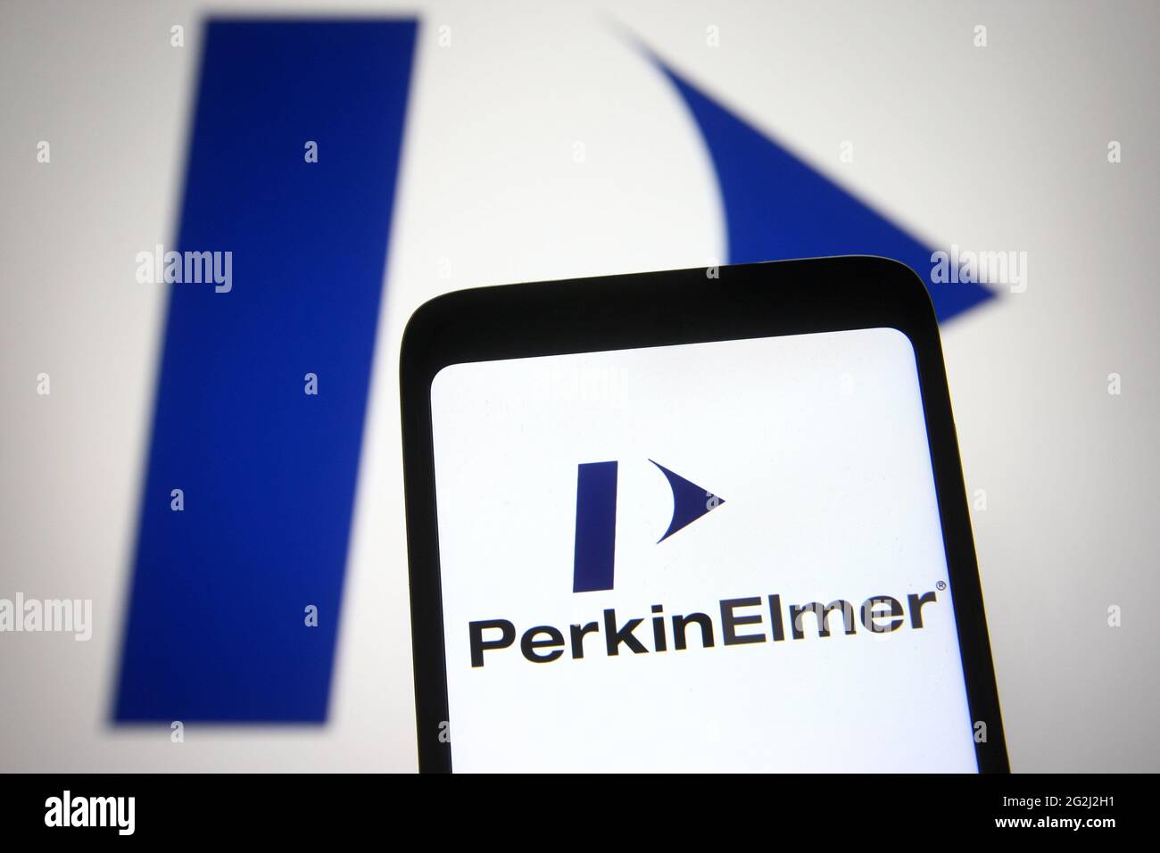 In this photo illustration a PerkinElmer logo is seen on a smartphone ...