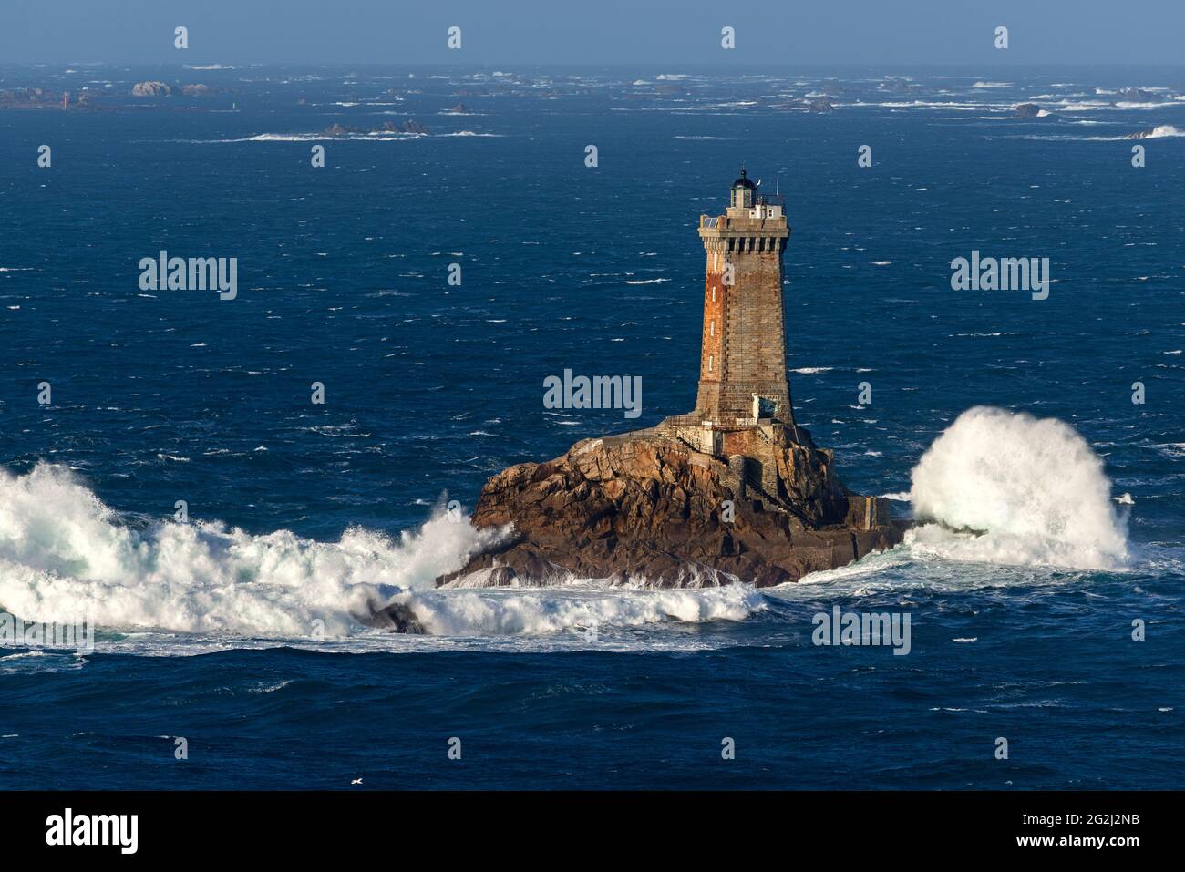 Lighthouse La Vieille in the sea in front of the Pointe du Raz, France ...
