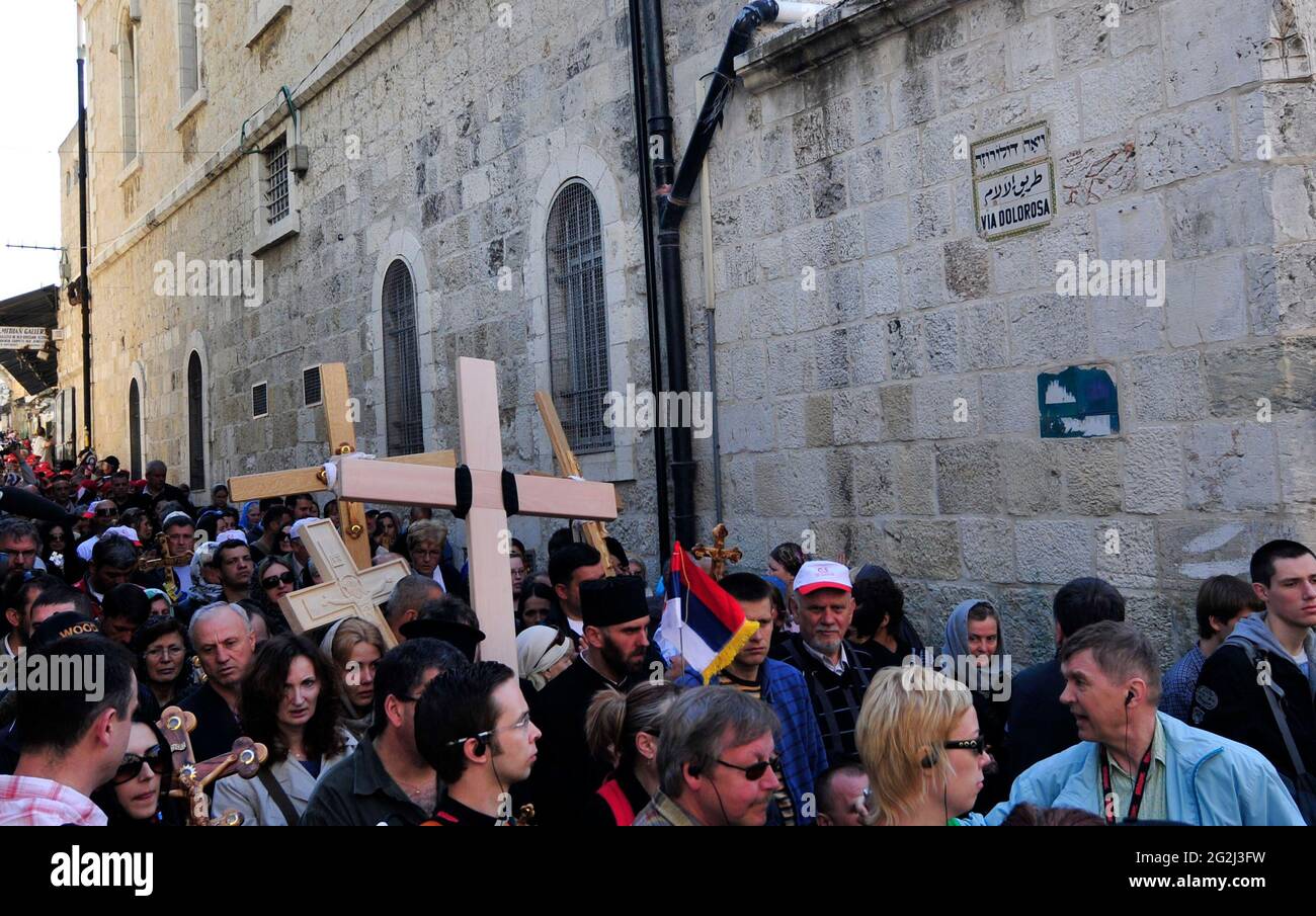 Russian Orthodox pilgrims walking through the Via Dolorosa during the ...
