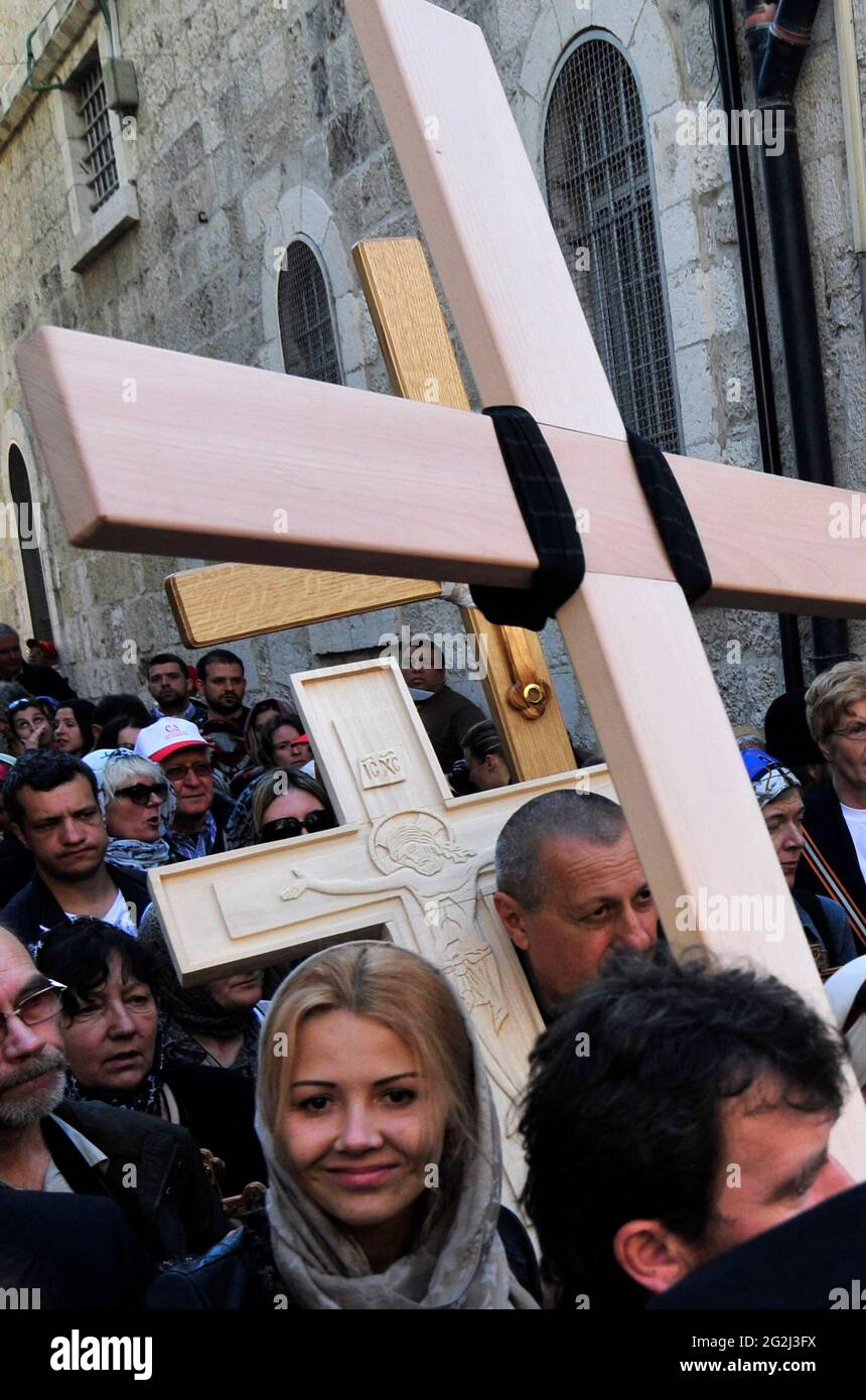 Russian Orthodox pilgrims walking through the Via Dolorosa during the ...