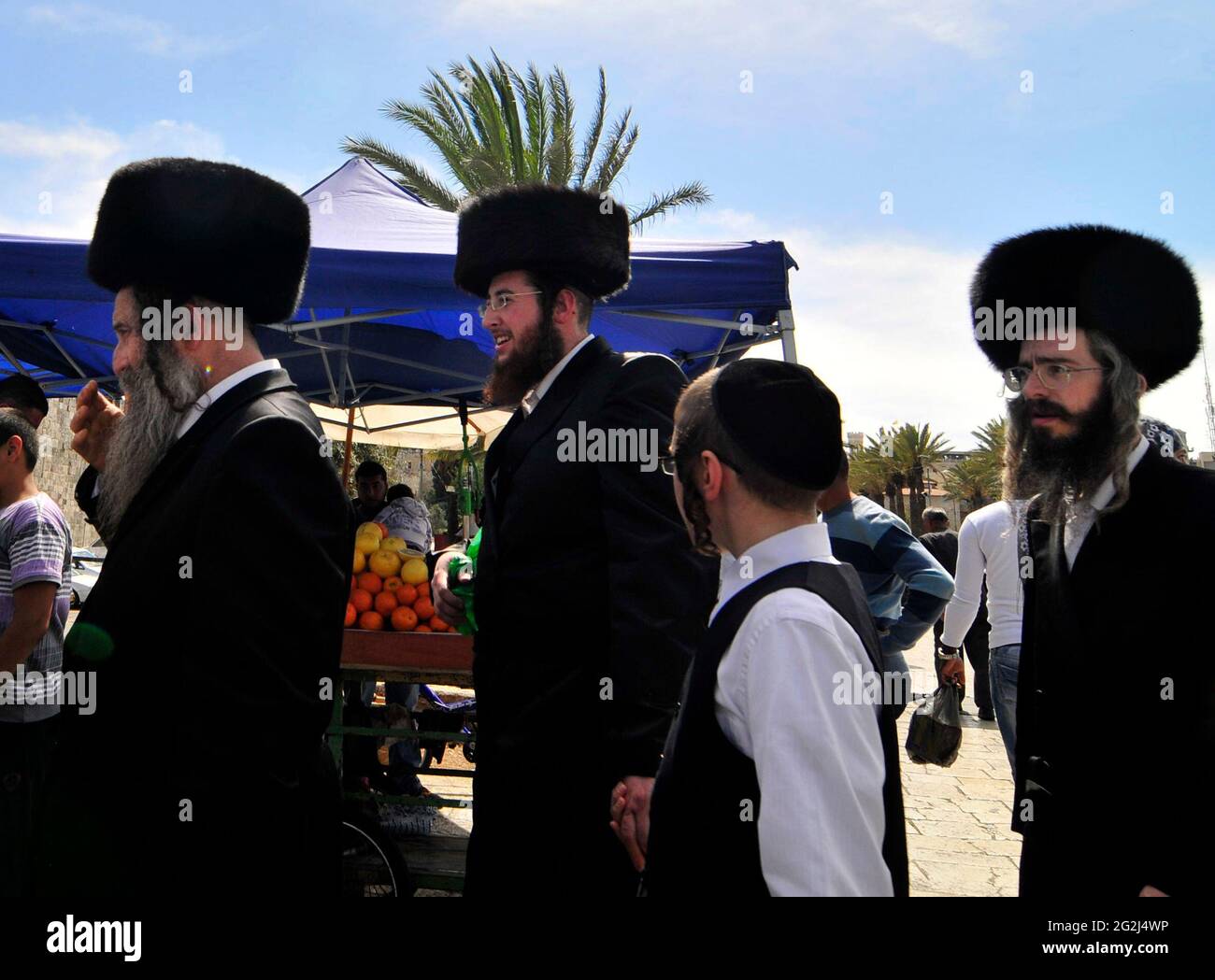 Hassidic Jewish men wearing traditional clothing including the ...