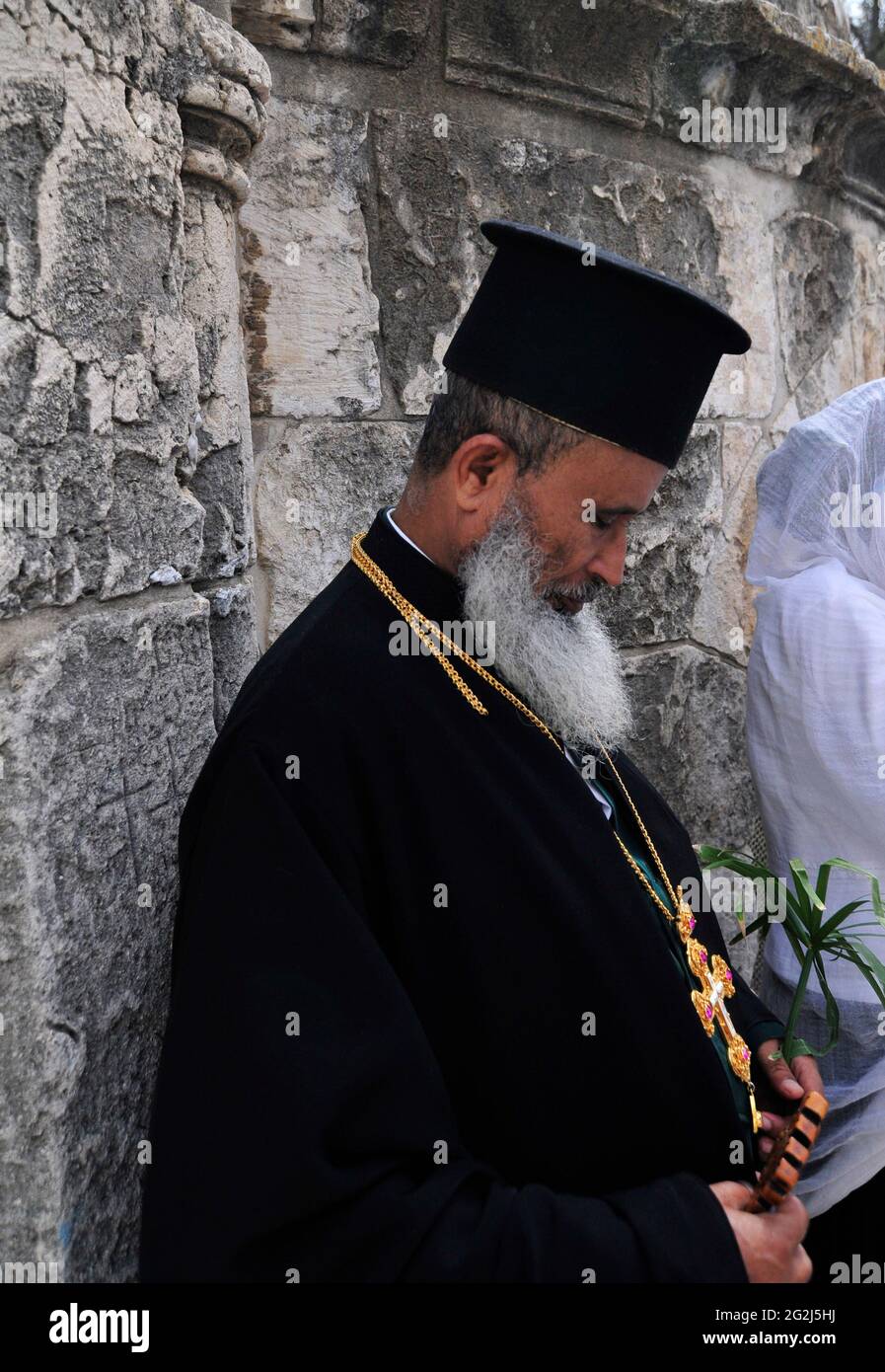 Ethiopian Orthodox priest at the Monastery of the Sultan on the rooftop ...