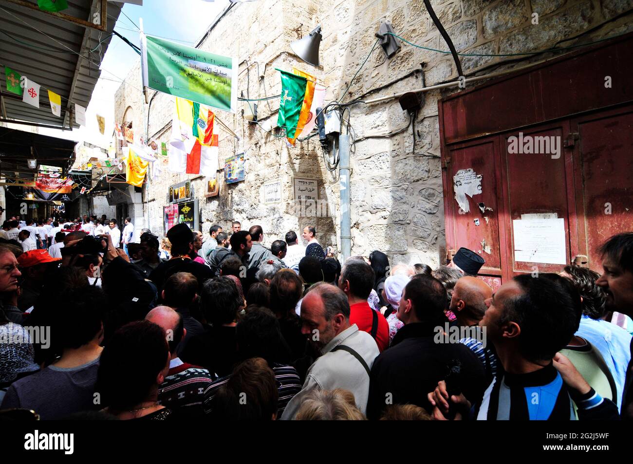 Religious Christian procession in the Christian quarter in the old city ...