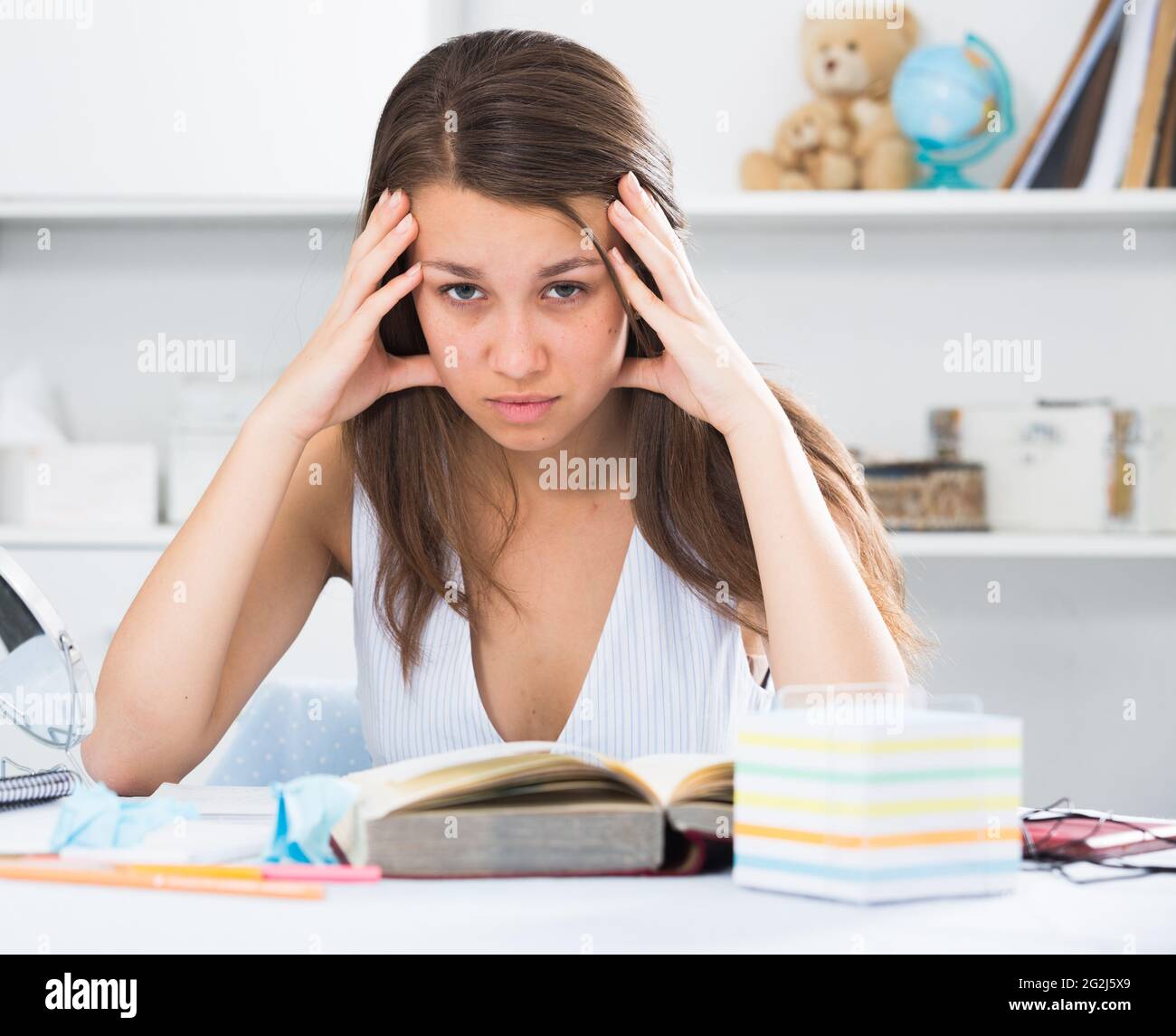Student girl is solving an equation Stock Photo - Alamy