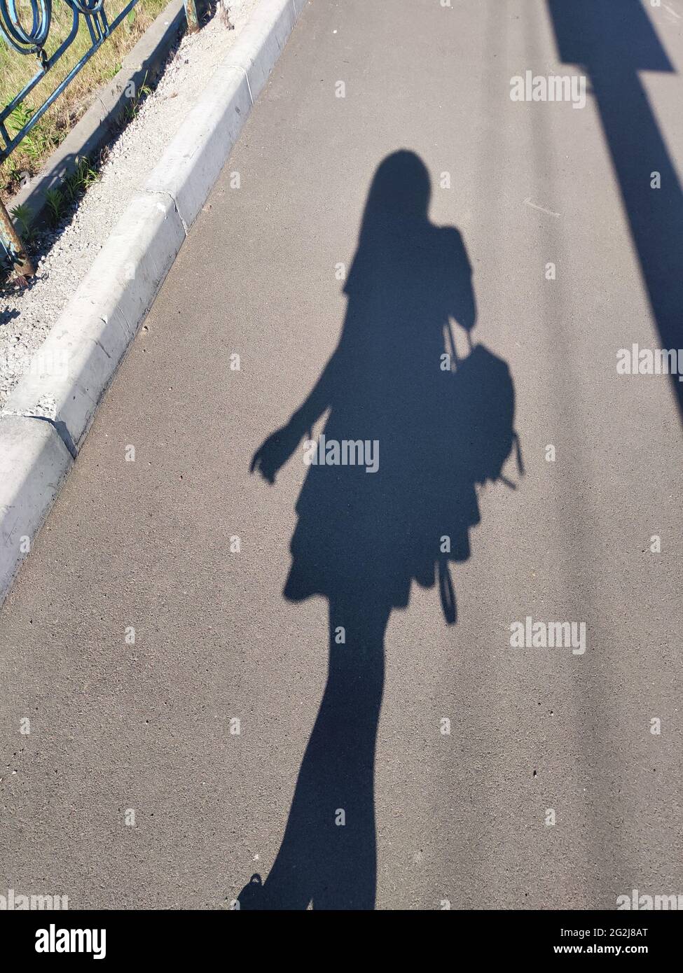 Woman shadow on street hi-res stock photography and images - Alamy