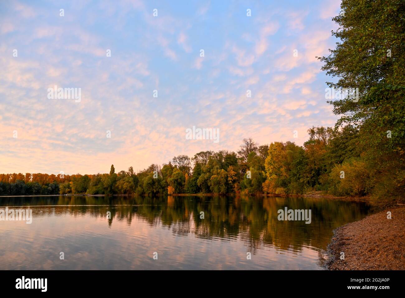 Germany, Baden-Wuerttemberg, Karlsruhe, sunset at Grötzinger Baggersee ...