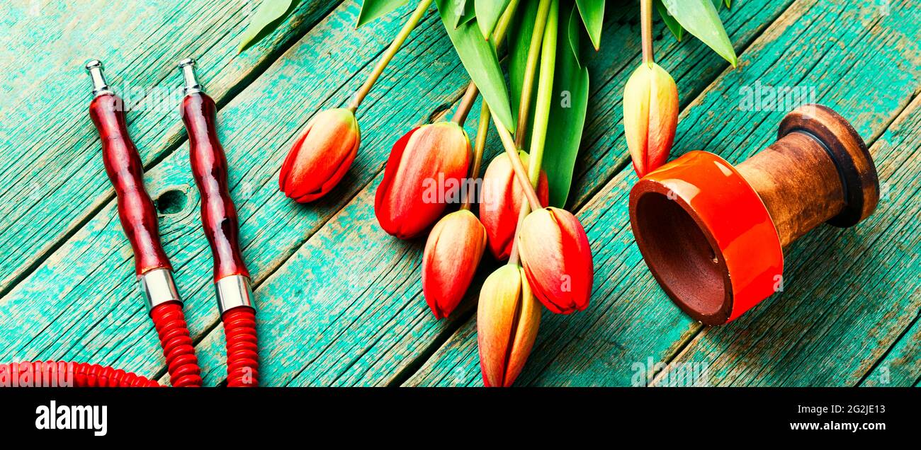 Modern hookah for smoking.Shisha with flower aroma.Flower hookah ...