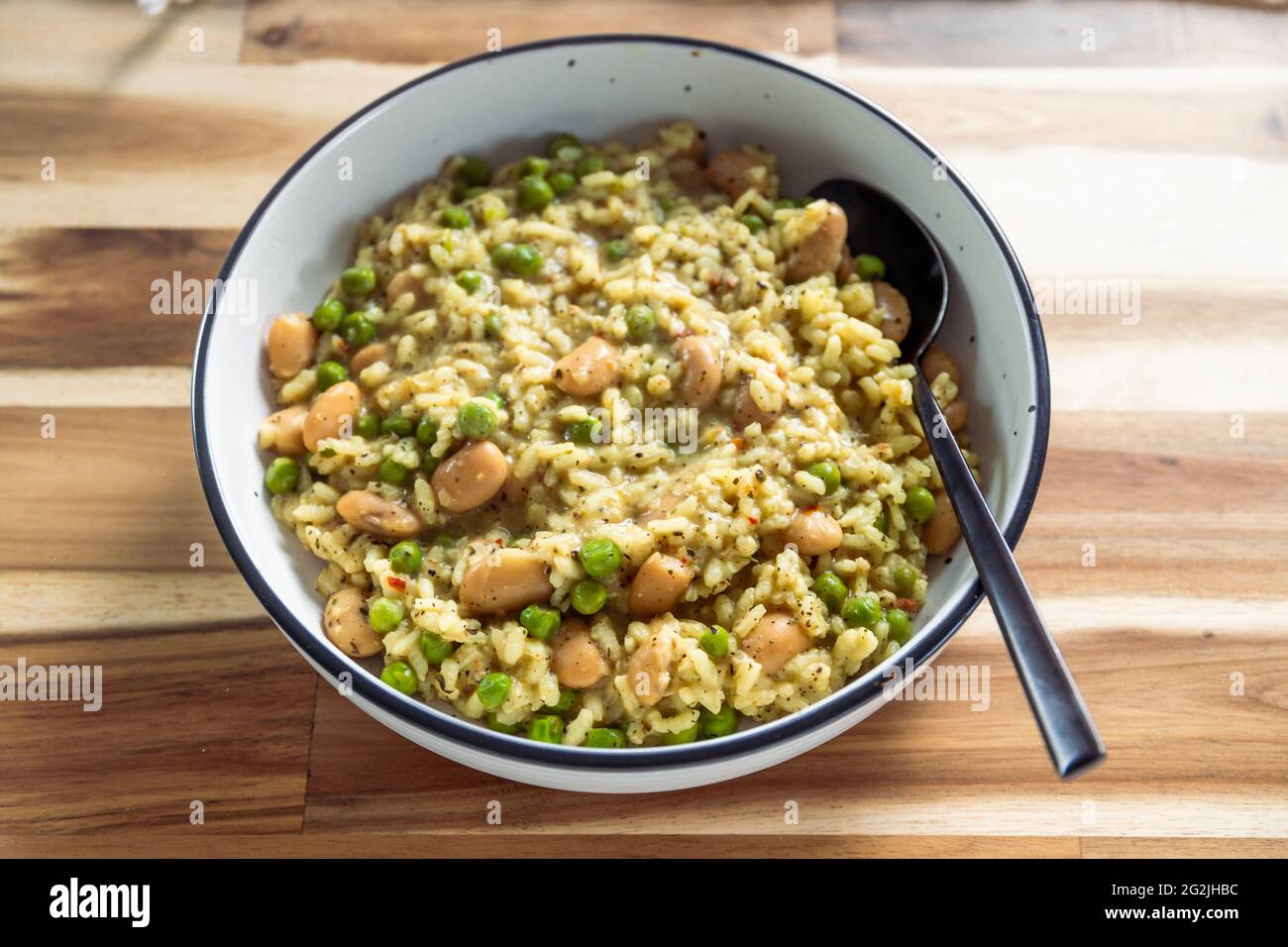 vegan peas and white beans risotto with nutritional yeast, healthy ...
