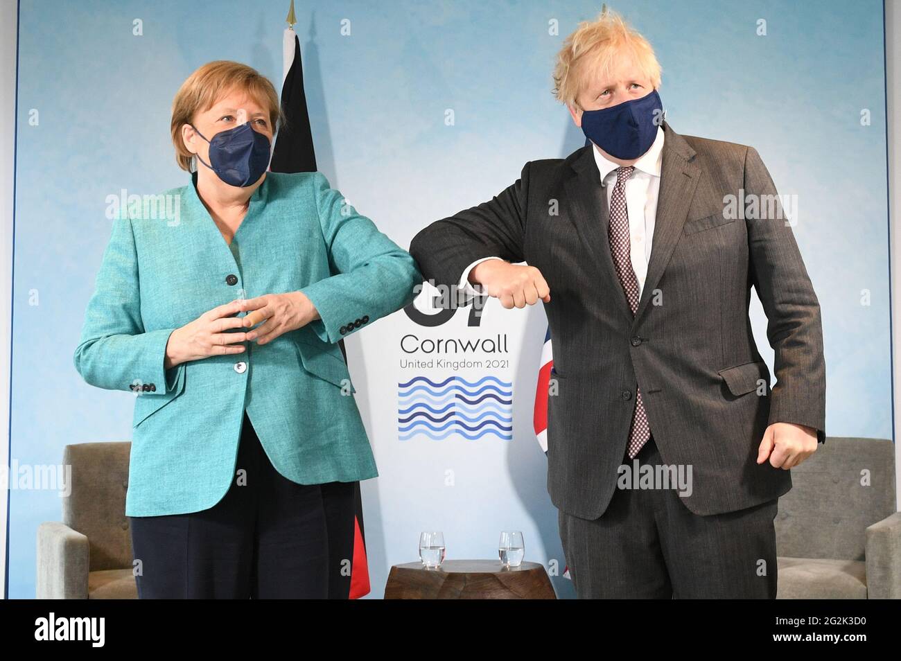 Prime Minister Boris Johnson (right) greets German Chancellor Angela ...