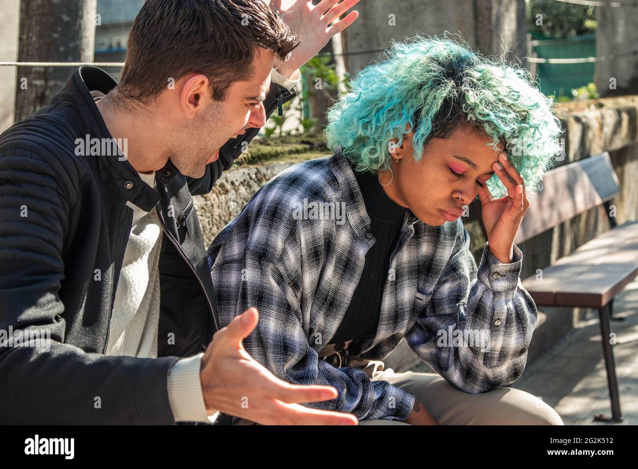 couple arguing or fighting screaming in the street Stock Photo - Alamy