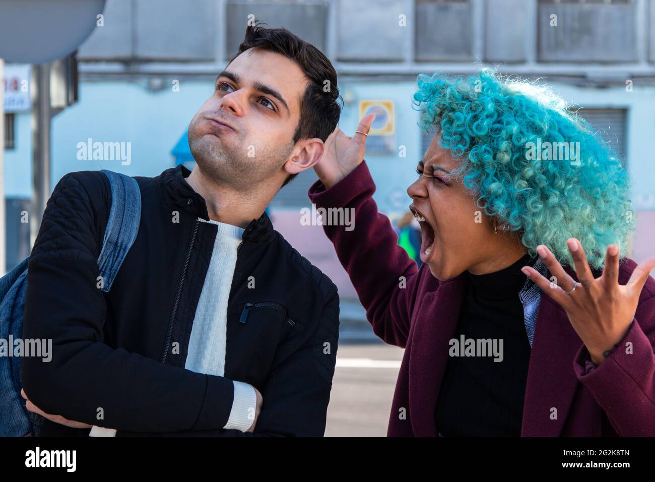 couple arguing or fighting in the street Stock Photo - Alamy