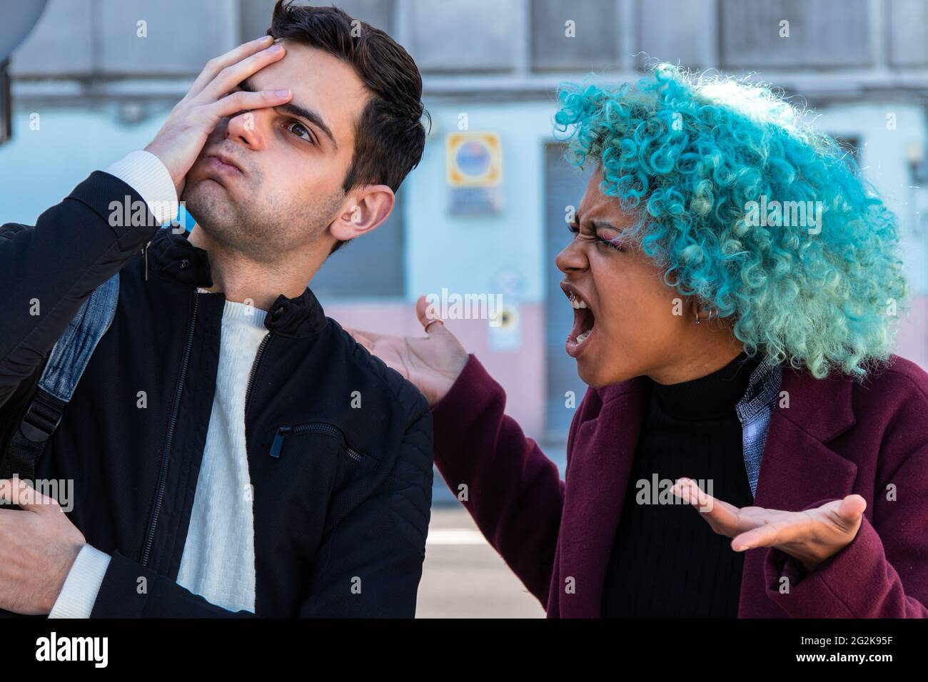 couple arguing or fighting in the street Stock Photo - Alamy