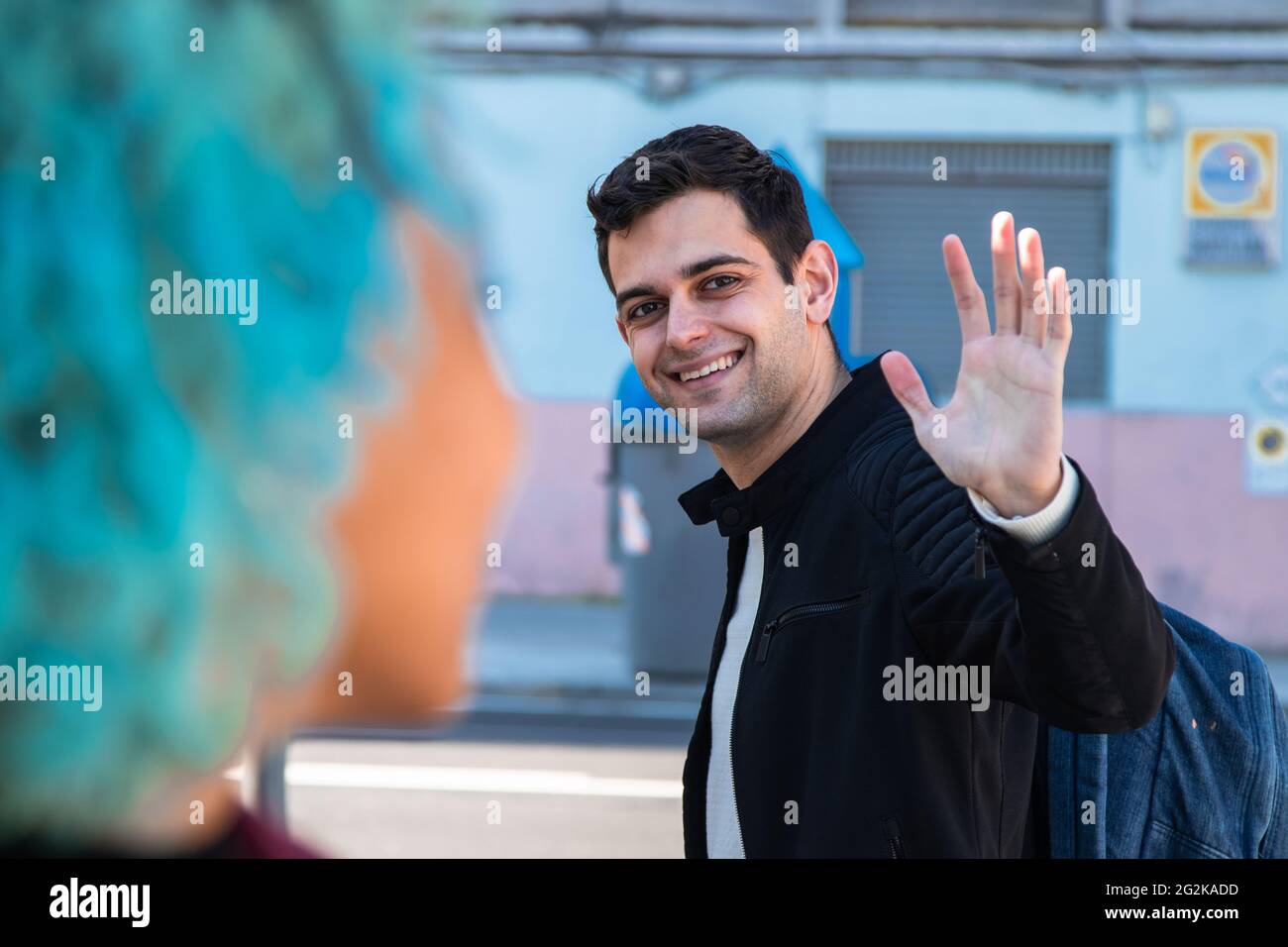 Lady waving greeting friends hi-res stock photography and images - Alamy