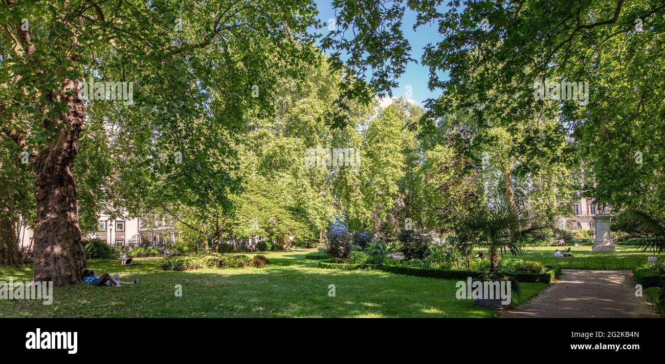The garden of St James's Square, London in summer; the garden is ...