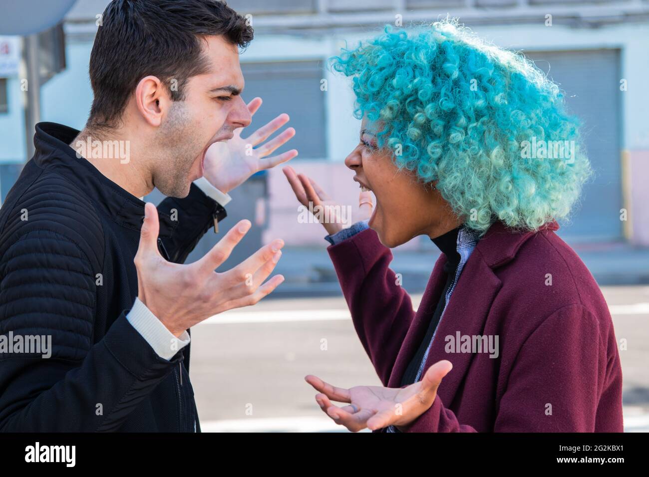 couple arguing screaming on the street Stock Photo - Alamy