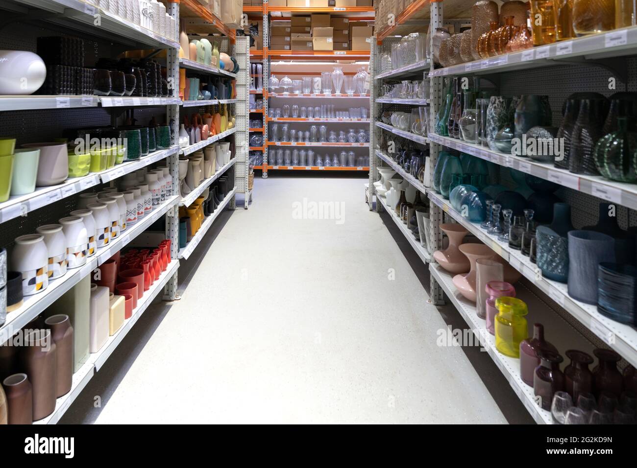 Vases store interior with assortment of ceramic kitchenware on shelves ...