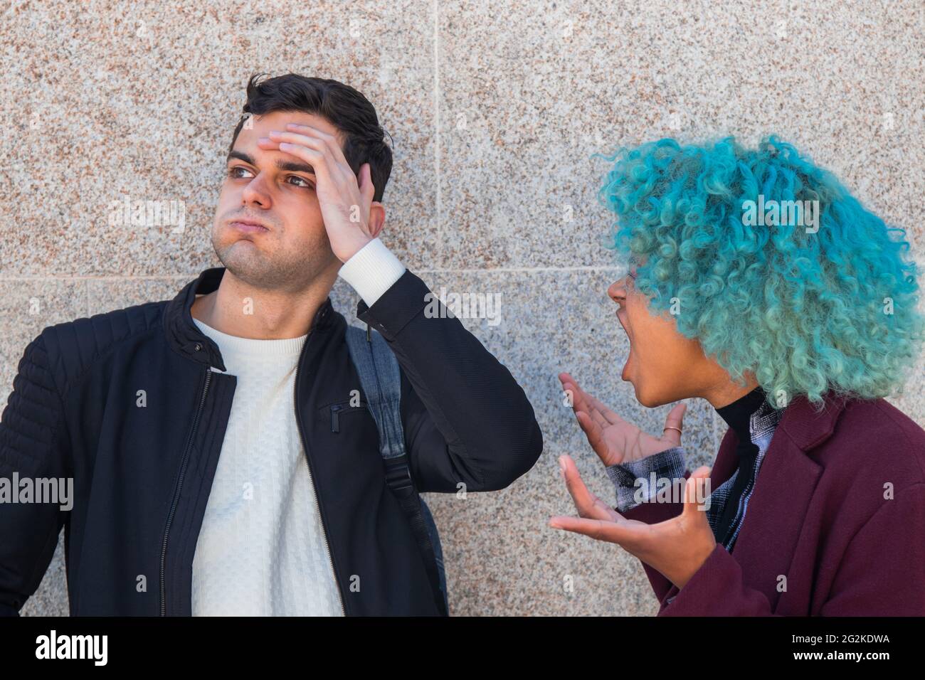 couple arguing or fighting in the street Stock Photo - Alamy