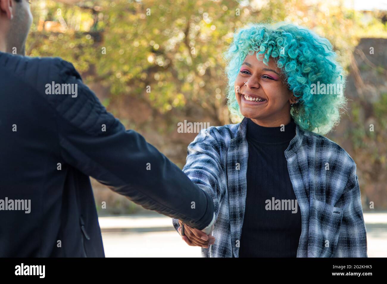 Boy and girl greeting each other hi-res stock photography and images ...