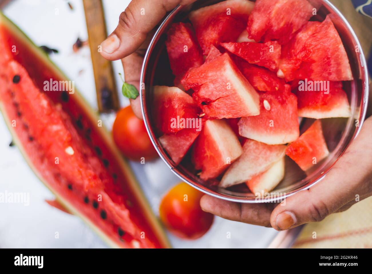 Hand holding watermelon hi-res stock photography and images - Alamy