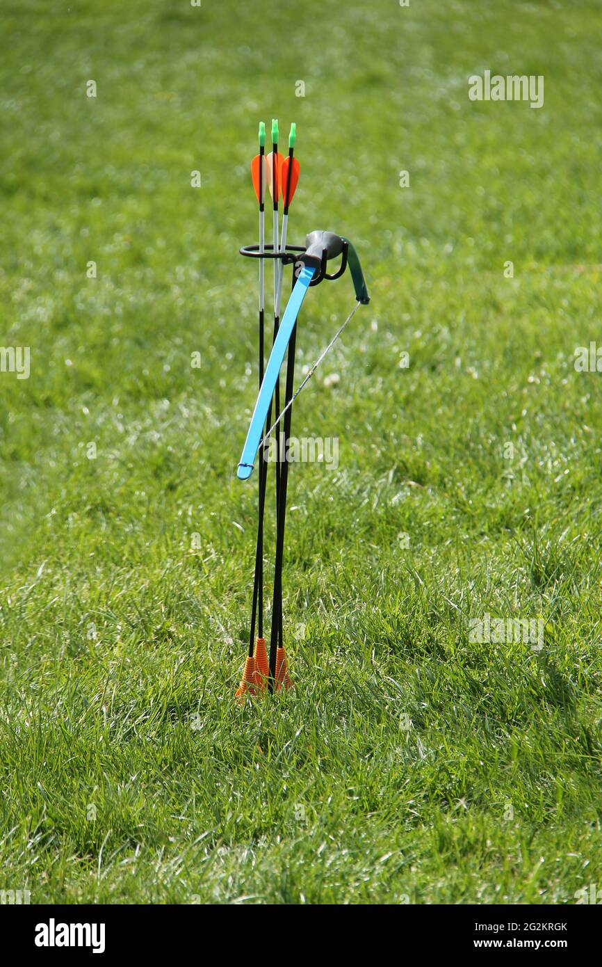 A Bow and Arrows on a Stand for Archery Sport Stock Photo - Alamy